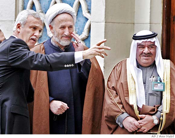 Iraq's factions urge a schedule for troop pullout / 100 Sunni, Shiite ...