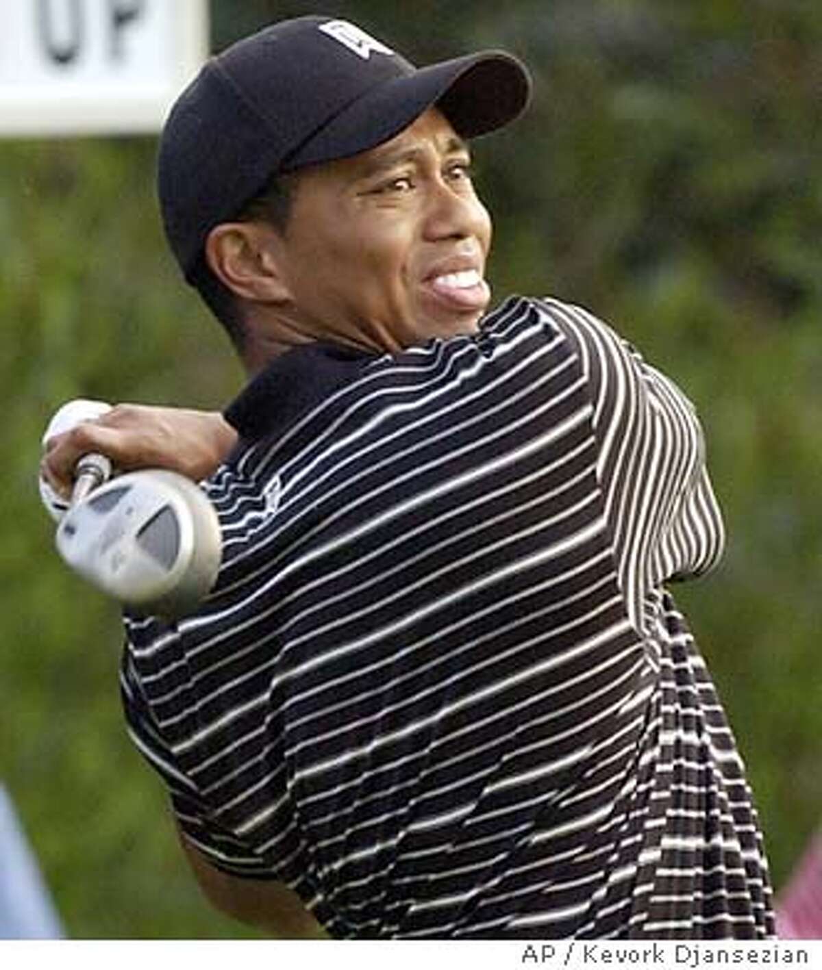 Tiger's about-face / Woods goes back to his old Titleist driver