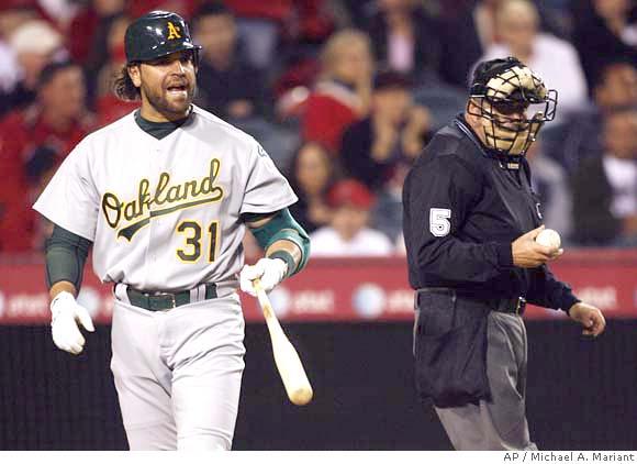 Aggressive A's run into a hot Lackey