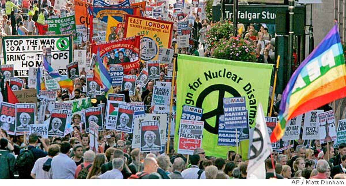 Thousands protest the Iraq war / SF also crowded with Loveparade revelers