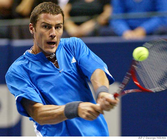 Safin keeps anger in check