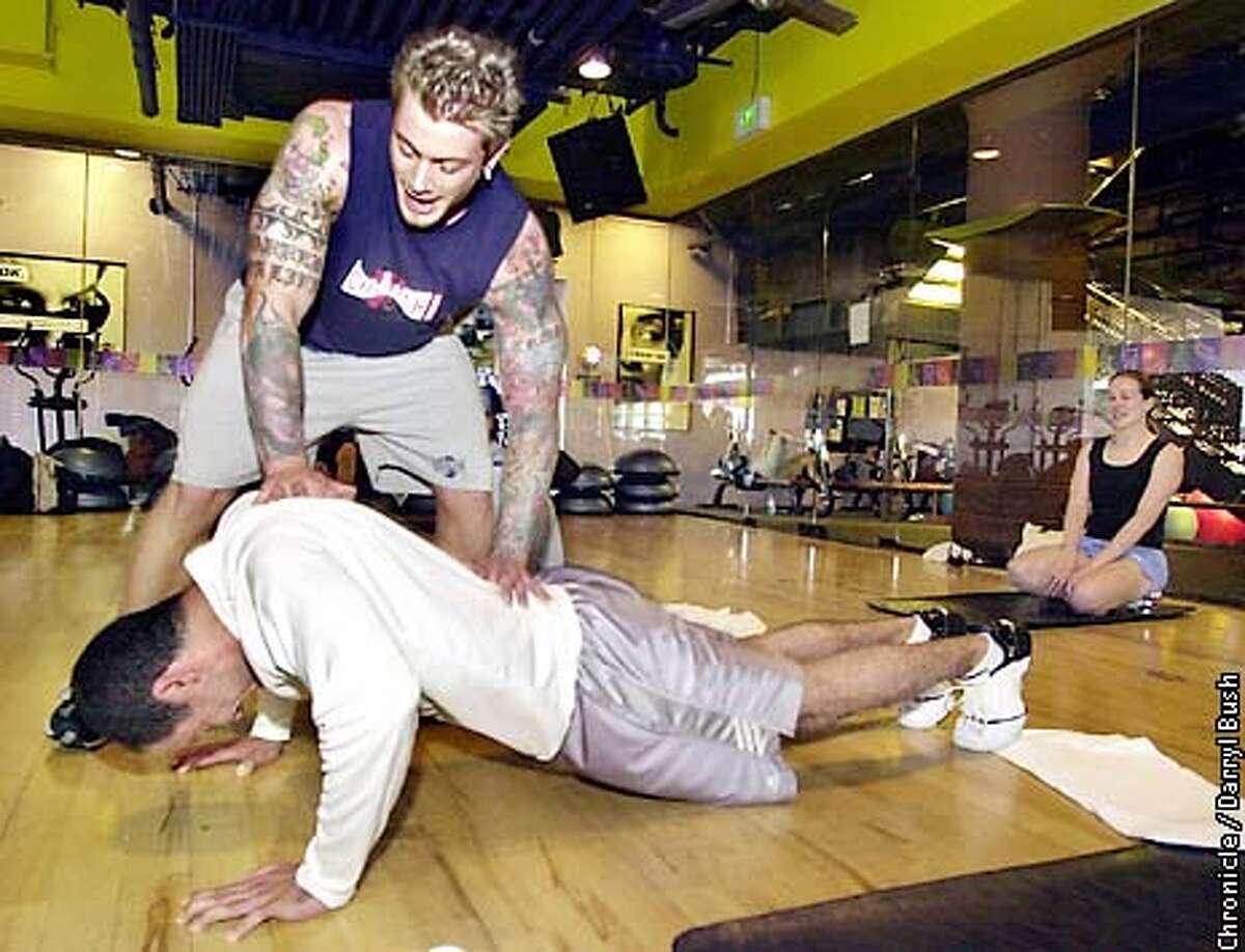 Going Navy / Grueling fitness class takes the SEAL route to a hot body