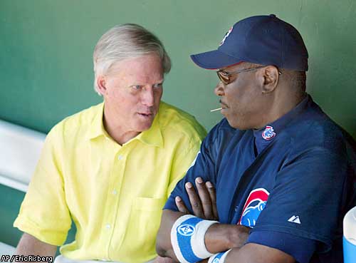 Dusty's back -- and still upset / In town with Cubs, he'll see friends ...