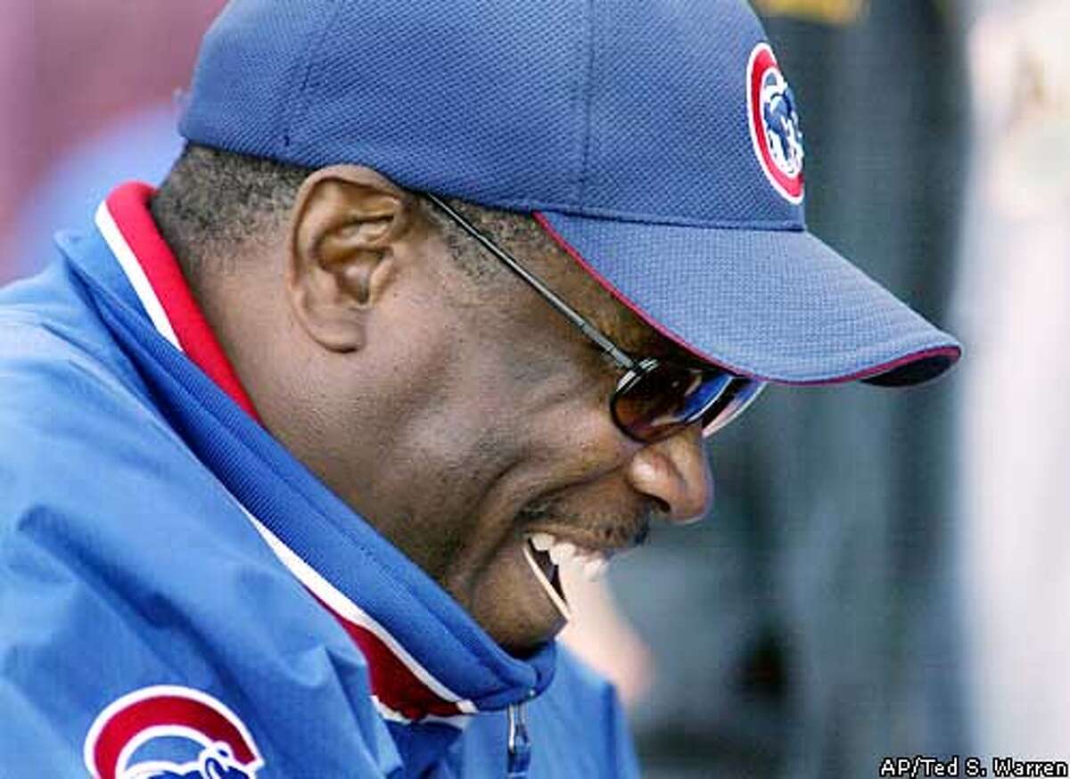 Dusty's back -- and still upset / In town with Cubs, he'll see friends ...