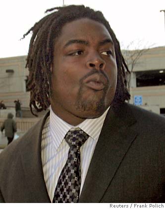 Bears' Tank Johnson faces the music -- sort of