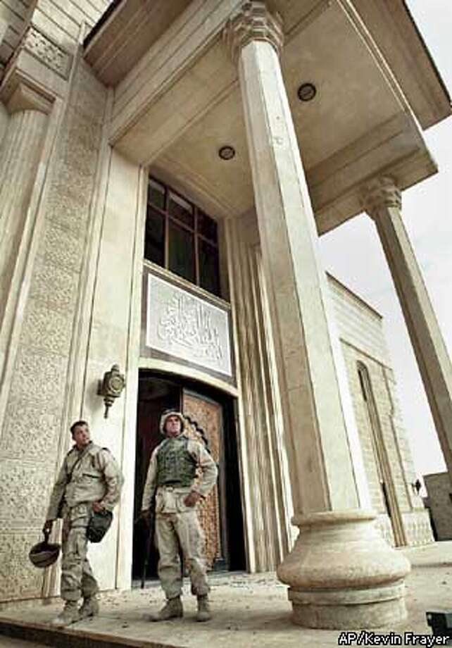 Palace at Tikrit becomes a salvage yard / Marines enjoy view before ...