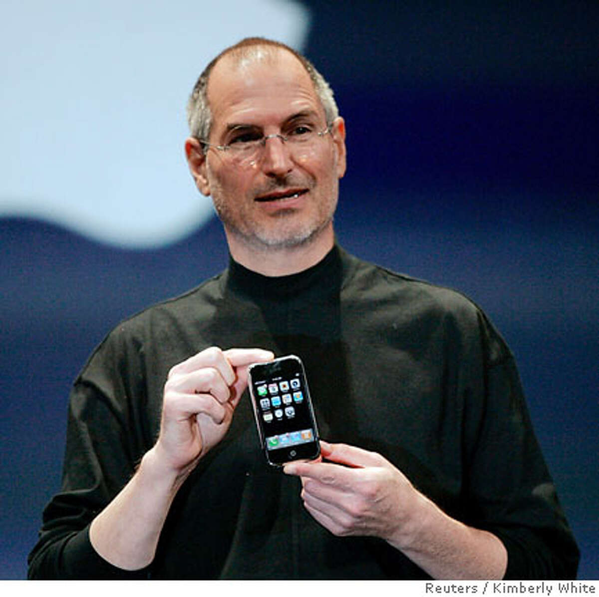 Apple unveils all-in-one iPhone / Cell phone will have music, Internet ...