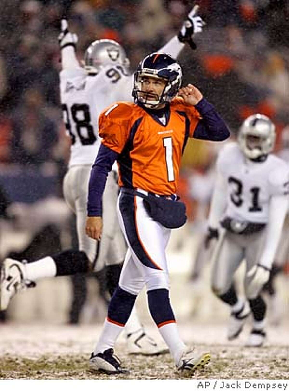 RAIDERS 25, BRONCOS 24 / Raiders ice the Broncos in wild one