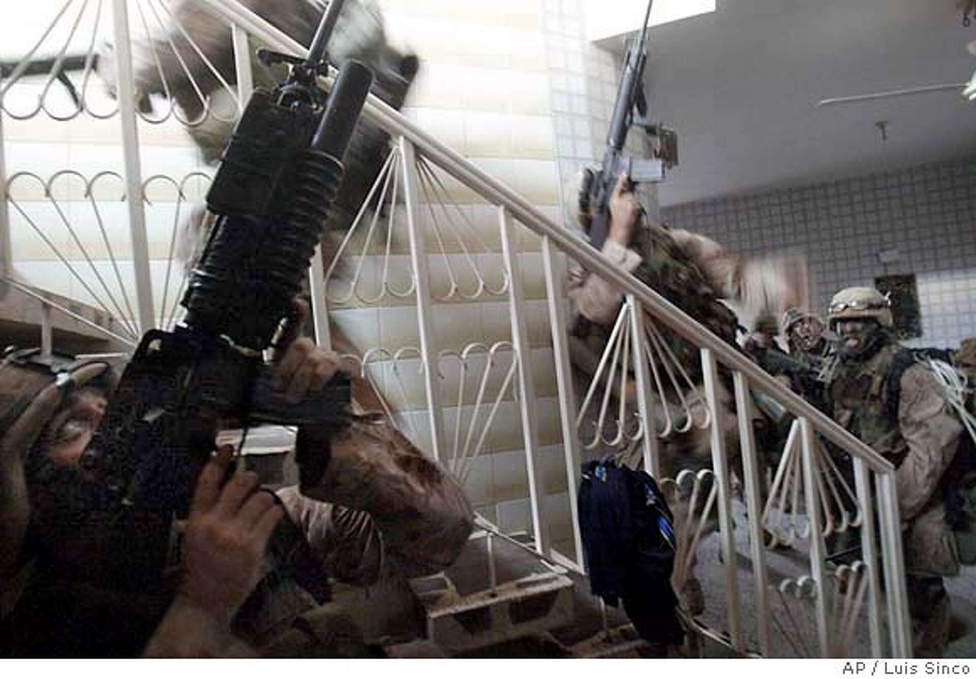 U.S. drives into heart of Fallujah / Army, Marines face rockets and ...