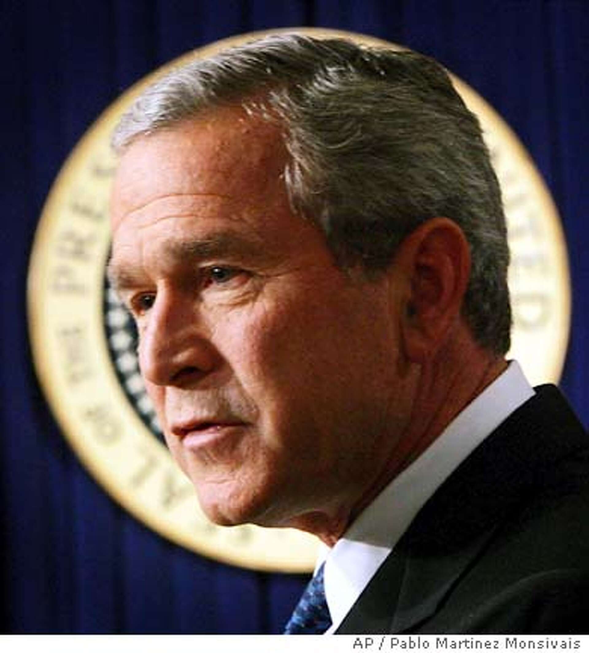 Bush claims mandate, sets 2nd-term goals / 'I earned capital in this ...