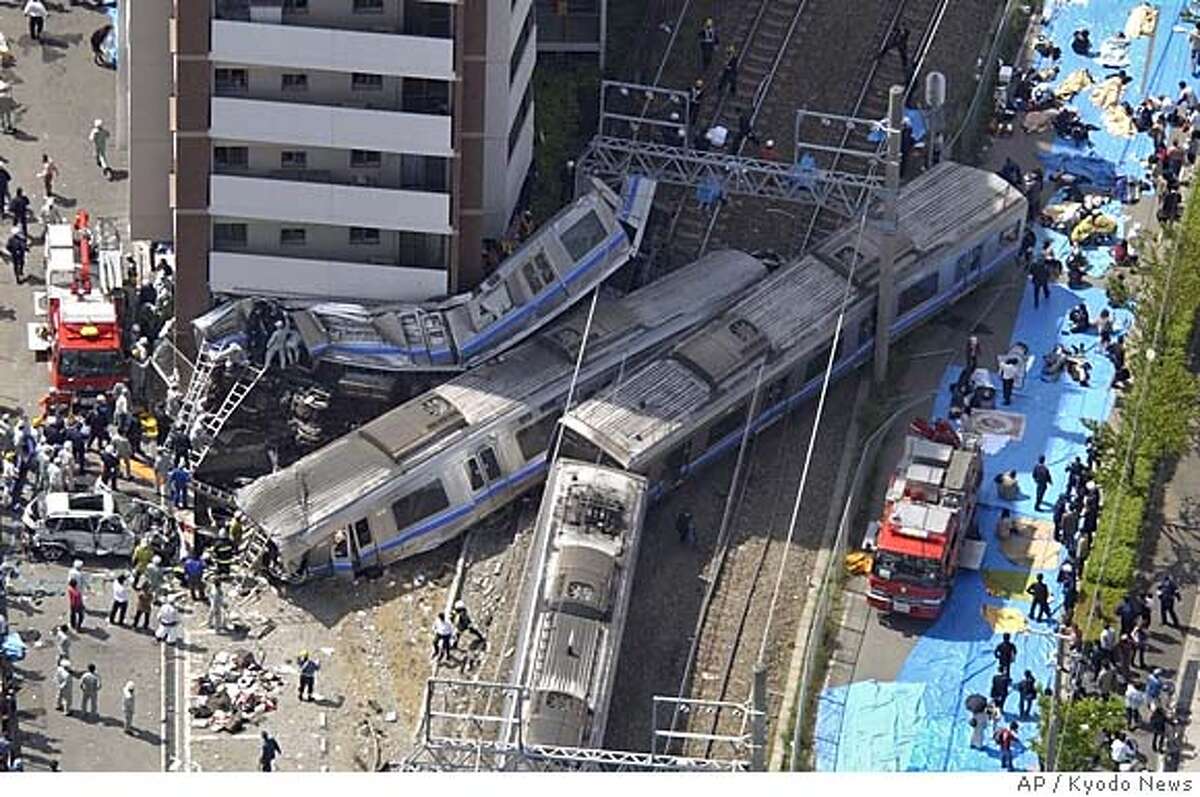 At least 73 dead in Japan rail crash / 7-car train slammed into building -- driver may have been ...