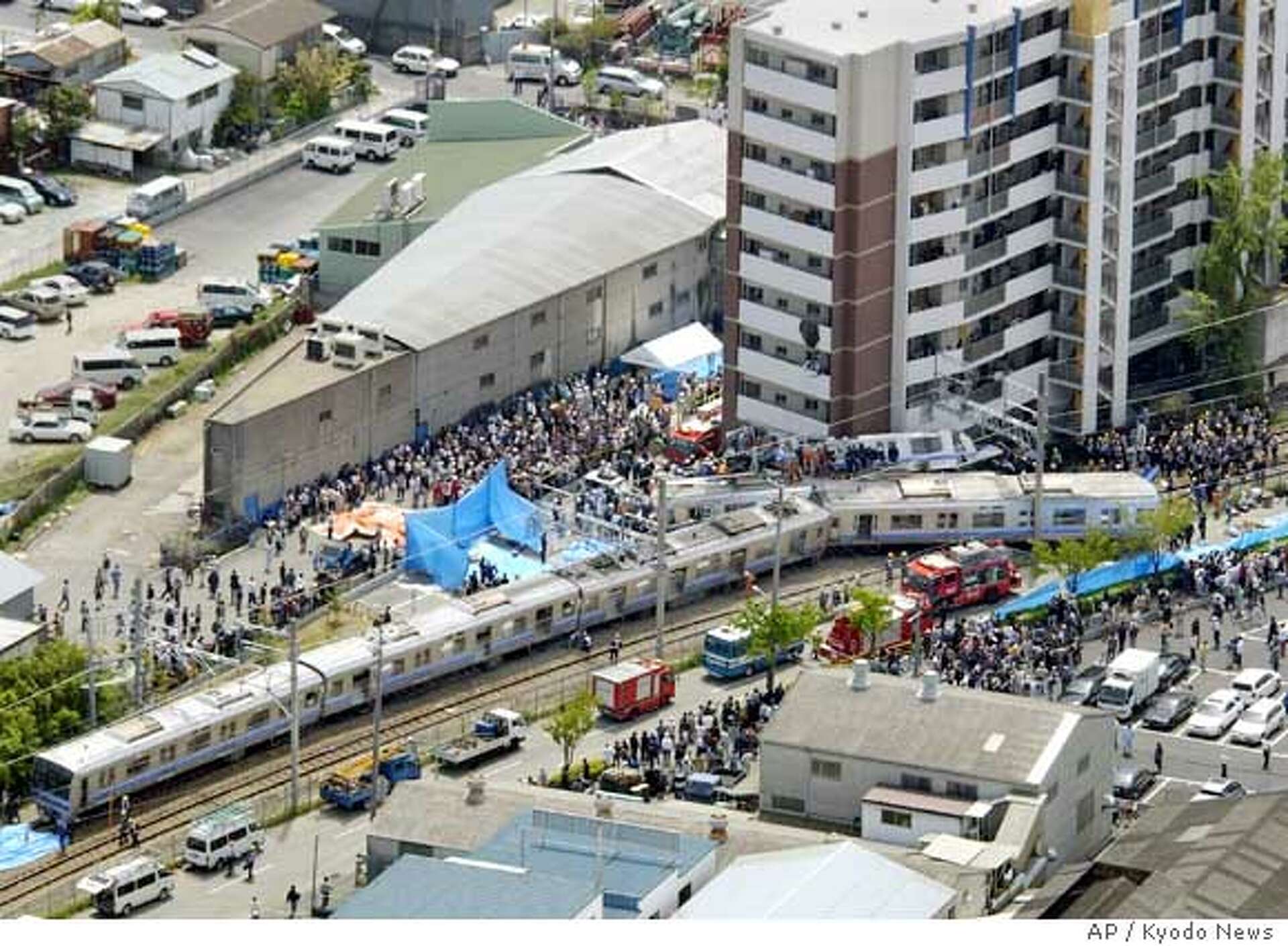 At least 73 dead in Japan rail crash / 7-car train slammed into ...