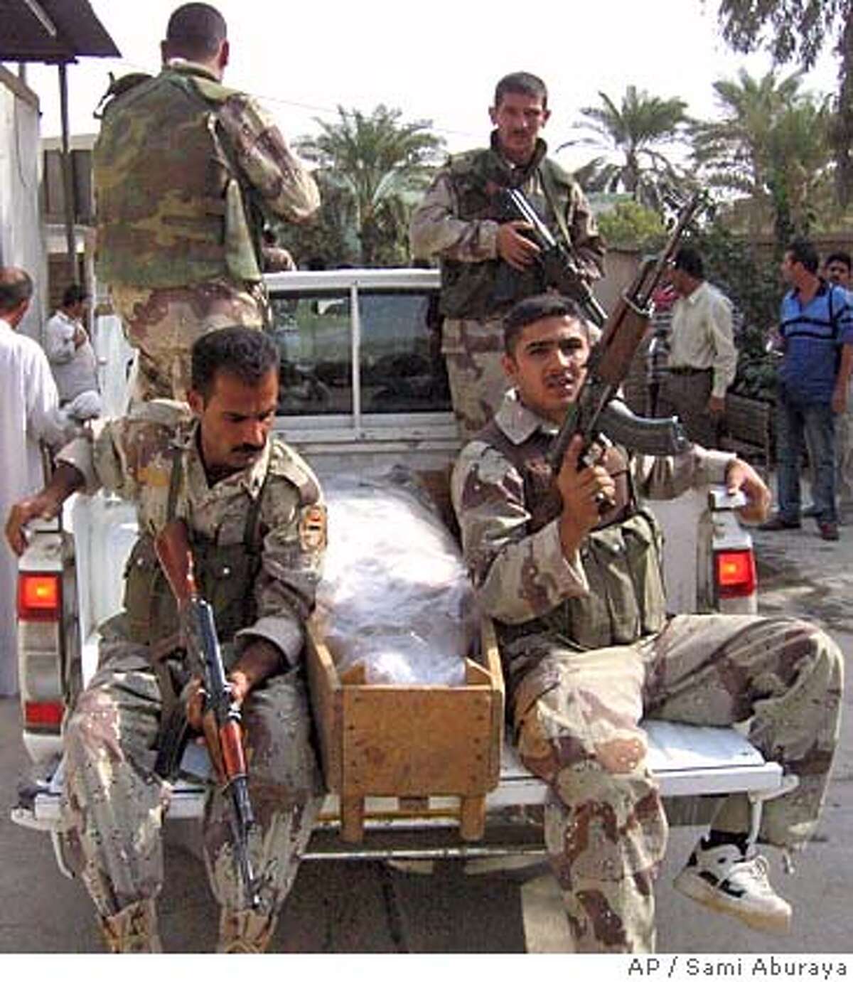 Massacre feared a setup / Infiltrators plague Iraqi security forces
