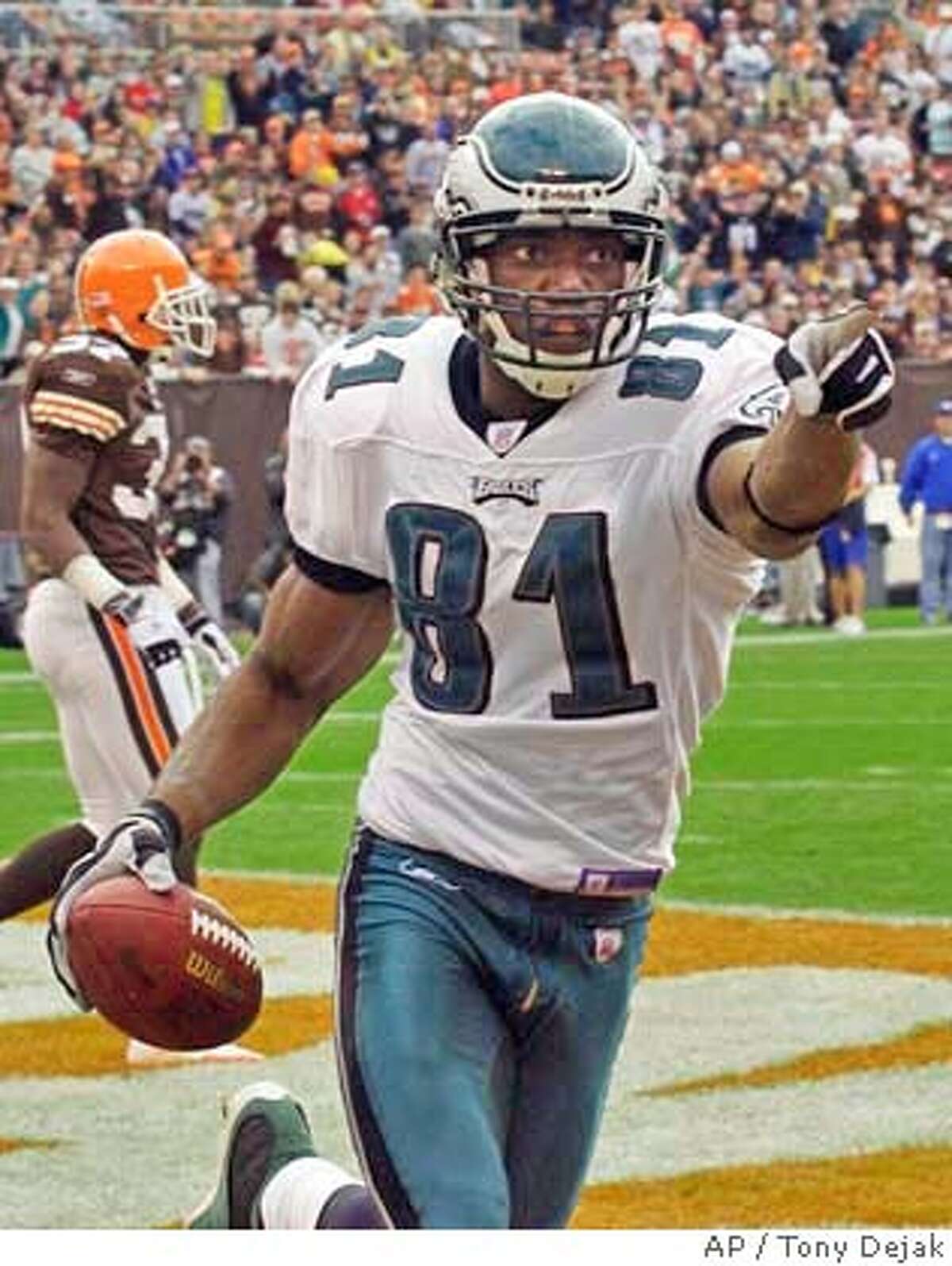 Eagles' Reid strikes a balance, keeping Owens happy, in check