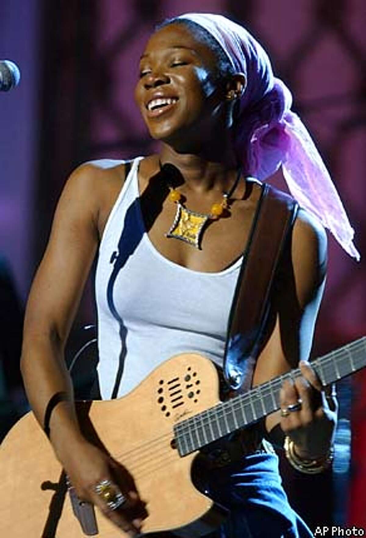 Passage to India / Singer's funky, spiritual sound adds depth to Black ...