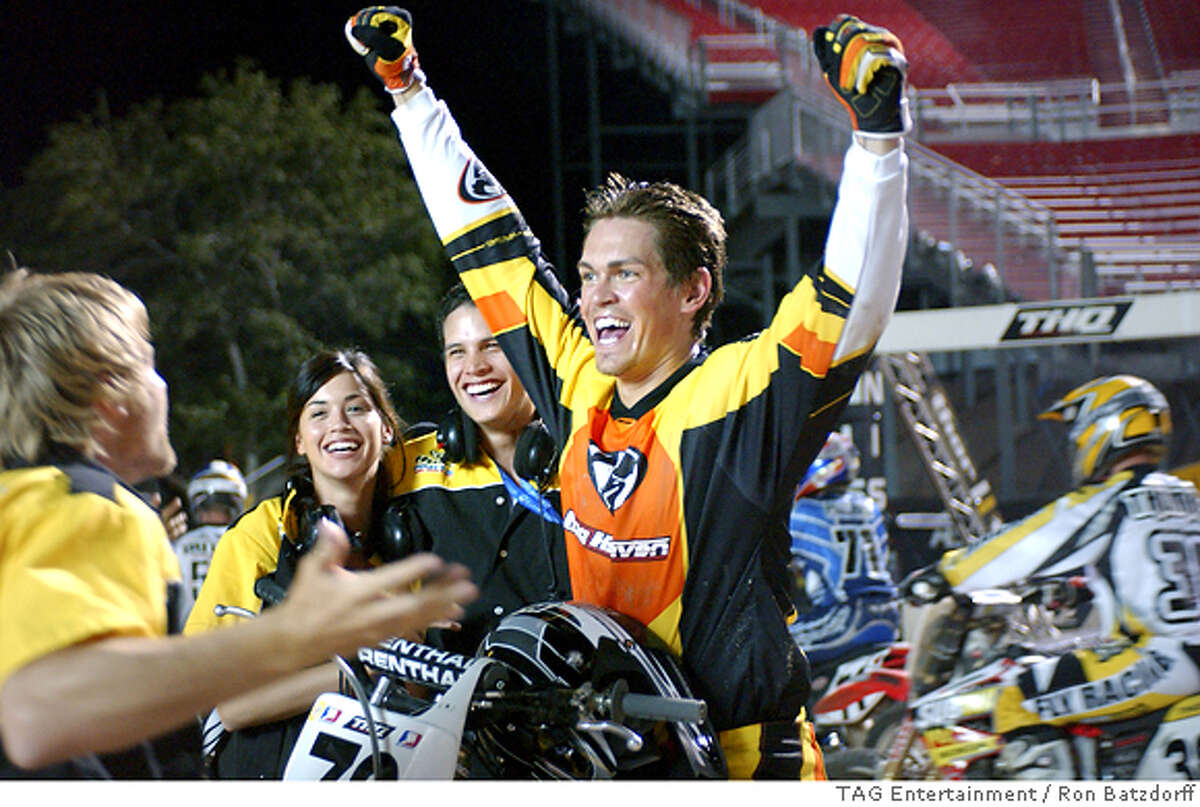 The highlight of 'Supercross' is a female motorcyclist doing a backward ...