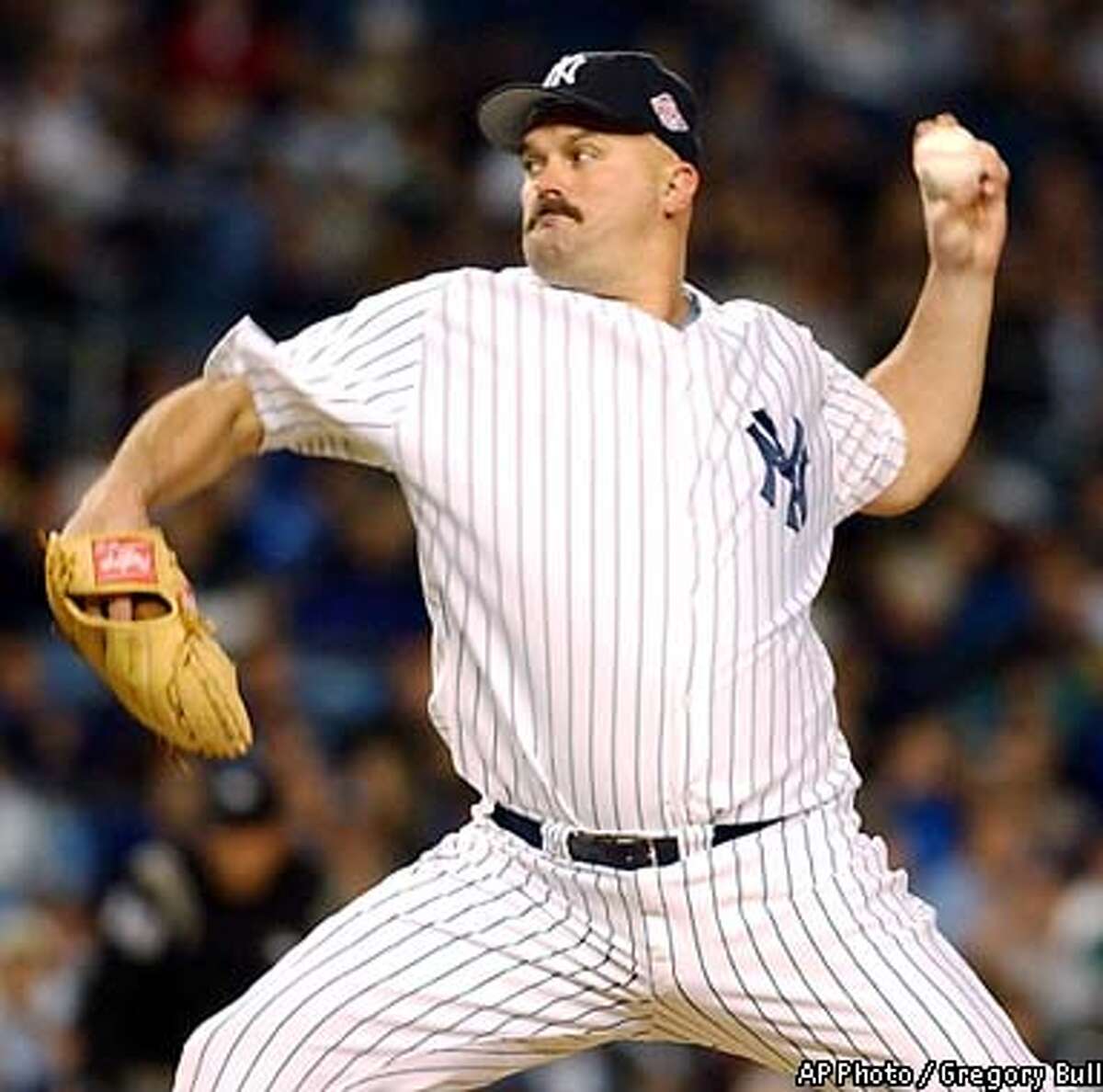 Yankees walk by A's / Patience at plate pays off for Bronx Bombers