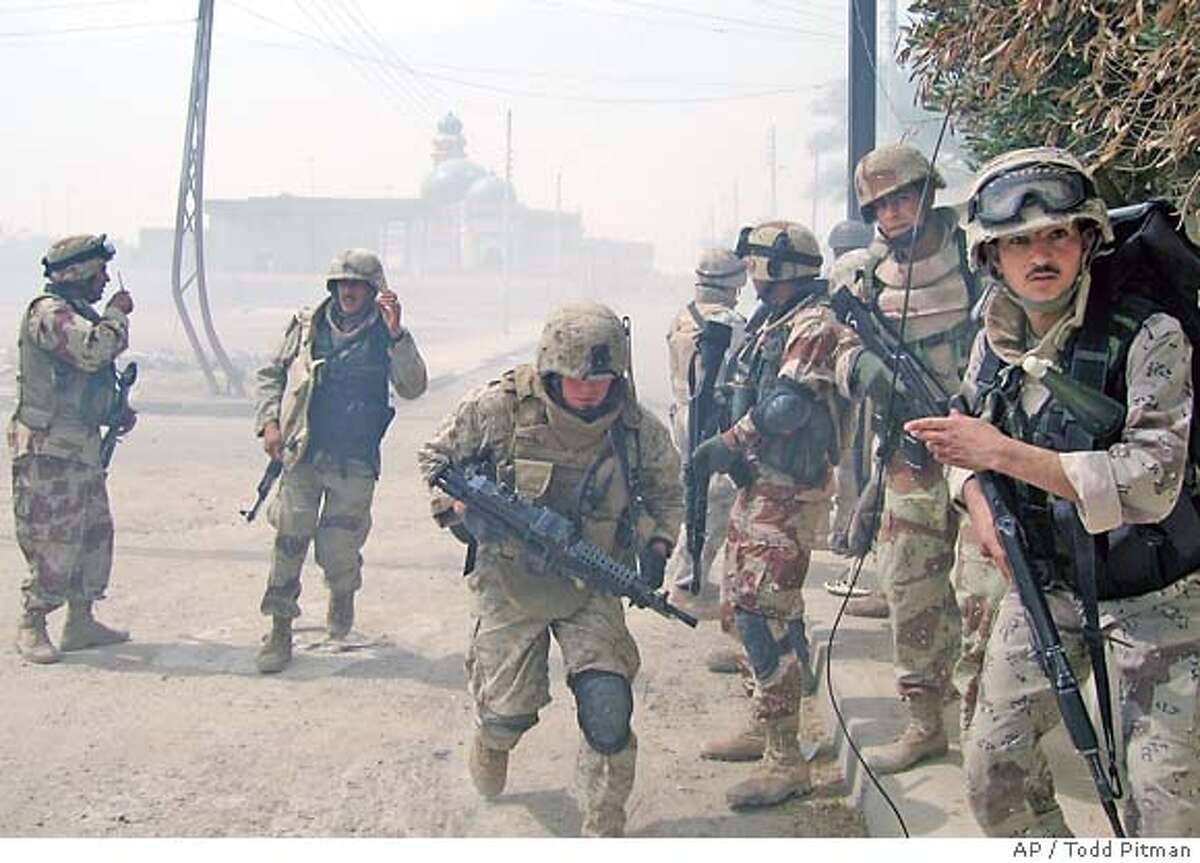 Digging a deeper hole / Like World War I, Iraq surge is move doomed to fail