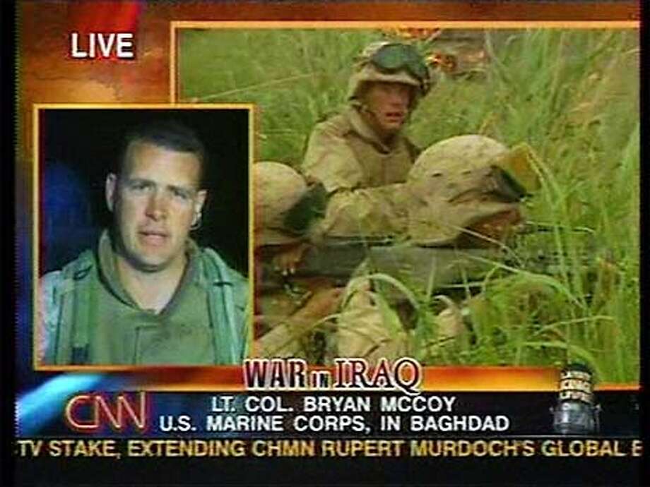 Baghdad falls / JUBILATION / Marines stumble upon a moment frozen in ...