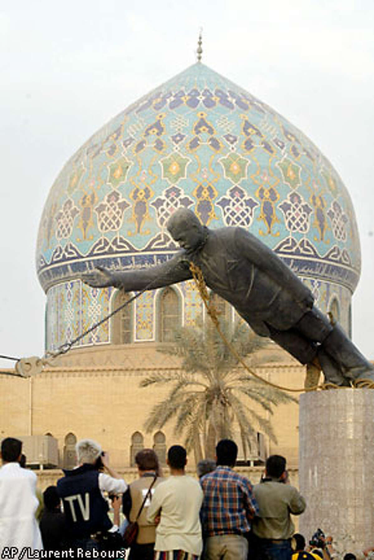 Baghdad falls / JUBILATION / Marines stumble upon a moment frozen in ...