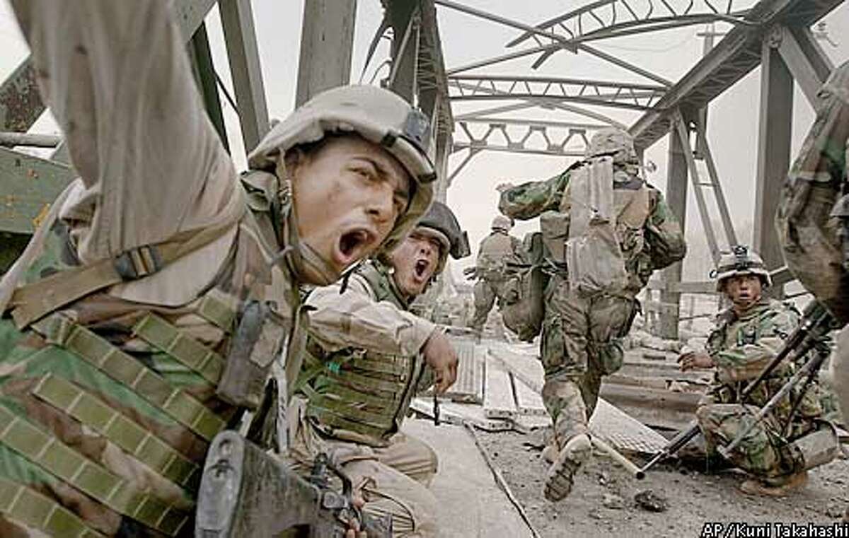 IN LINE OF FIRE: Artillery hits Marines in fierce fight for bridge