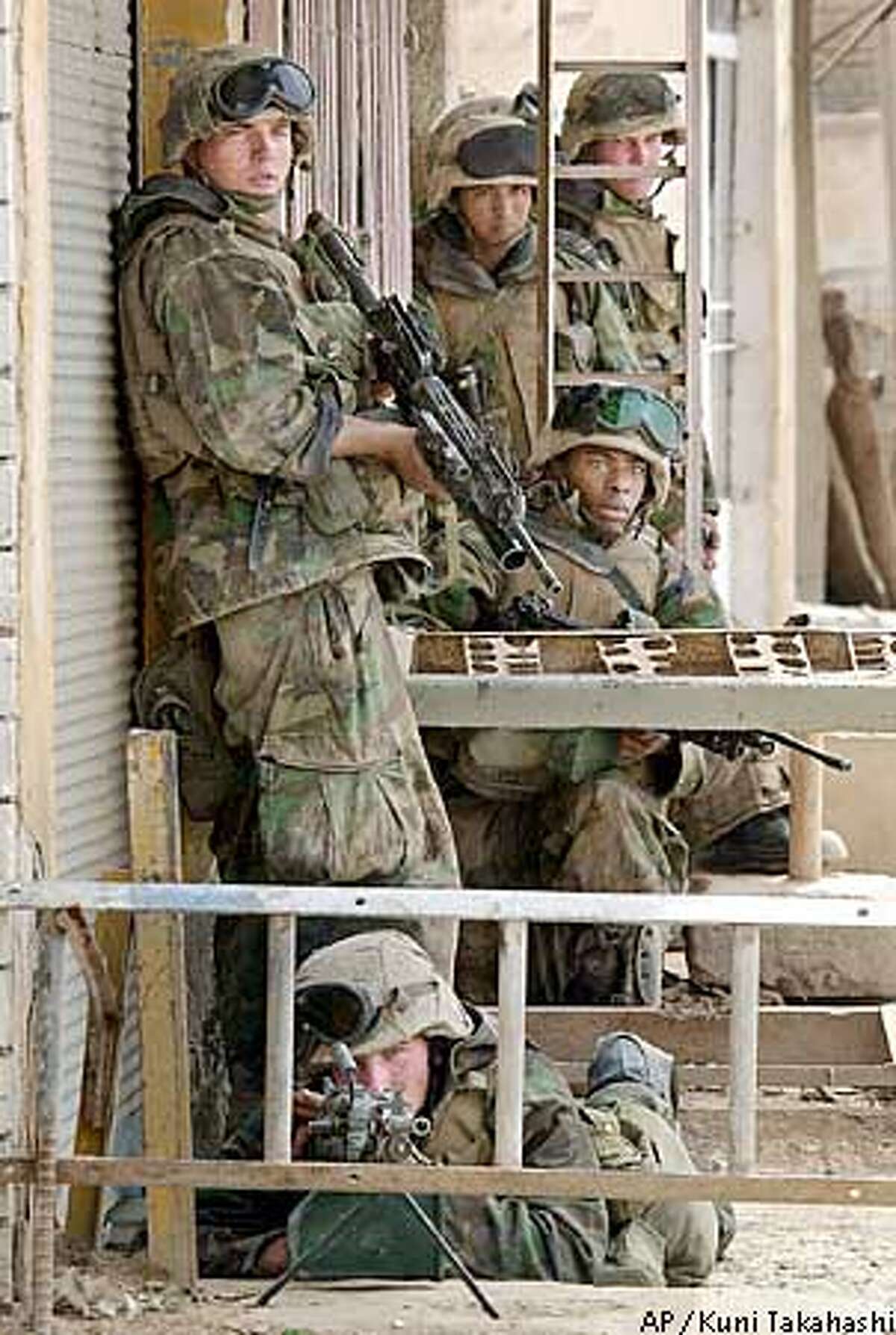 IN LINE OF FIRE: Artillery hits Marines in fierce fight for bridge