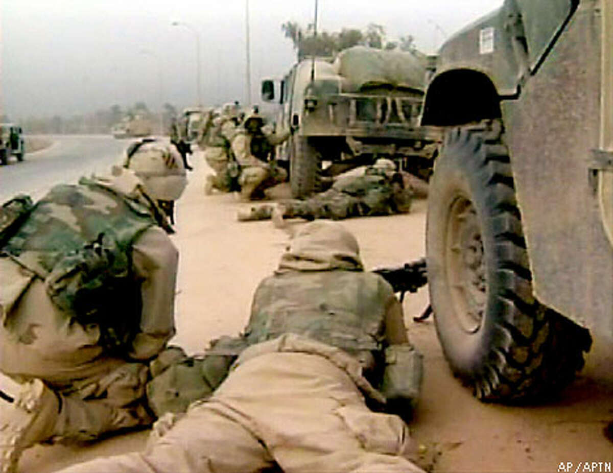 Sudden drive into Baghdad / 'SPORADIC FIGHTING': U.S. forces near heart ...