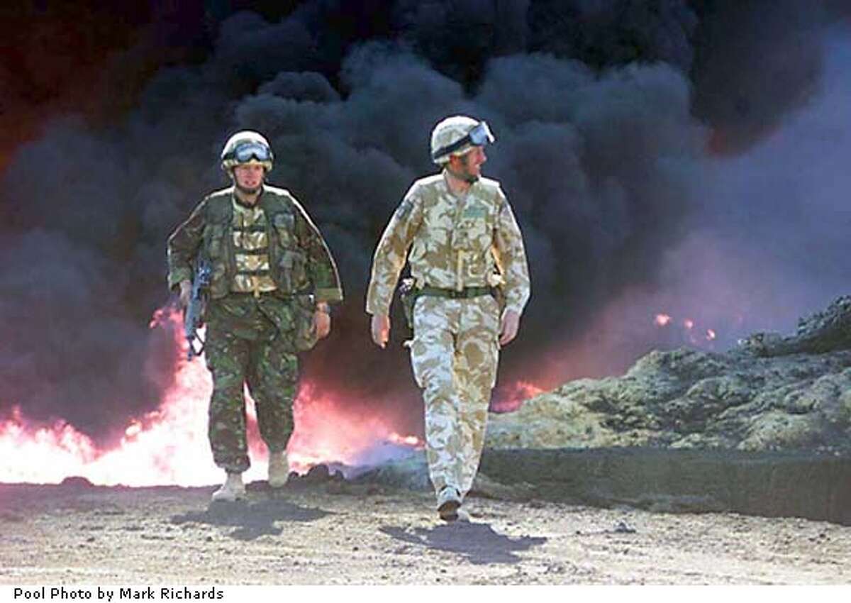 Tanks, troops battle for Baghdad airport / STRATEGY: Cut off Baghdad ...