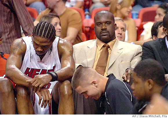 Everything's been crazy with the Heat / Shaq's return may spell relief