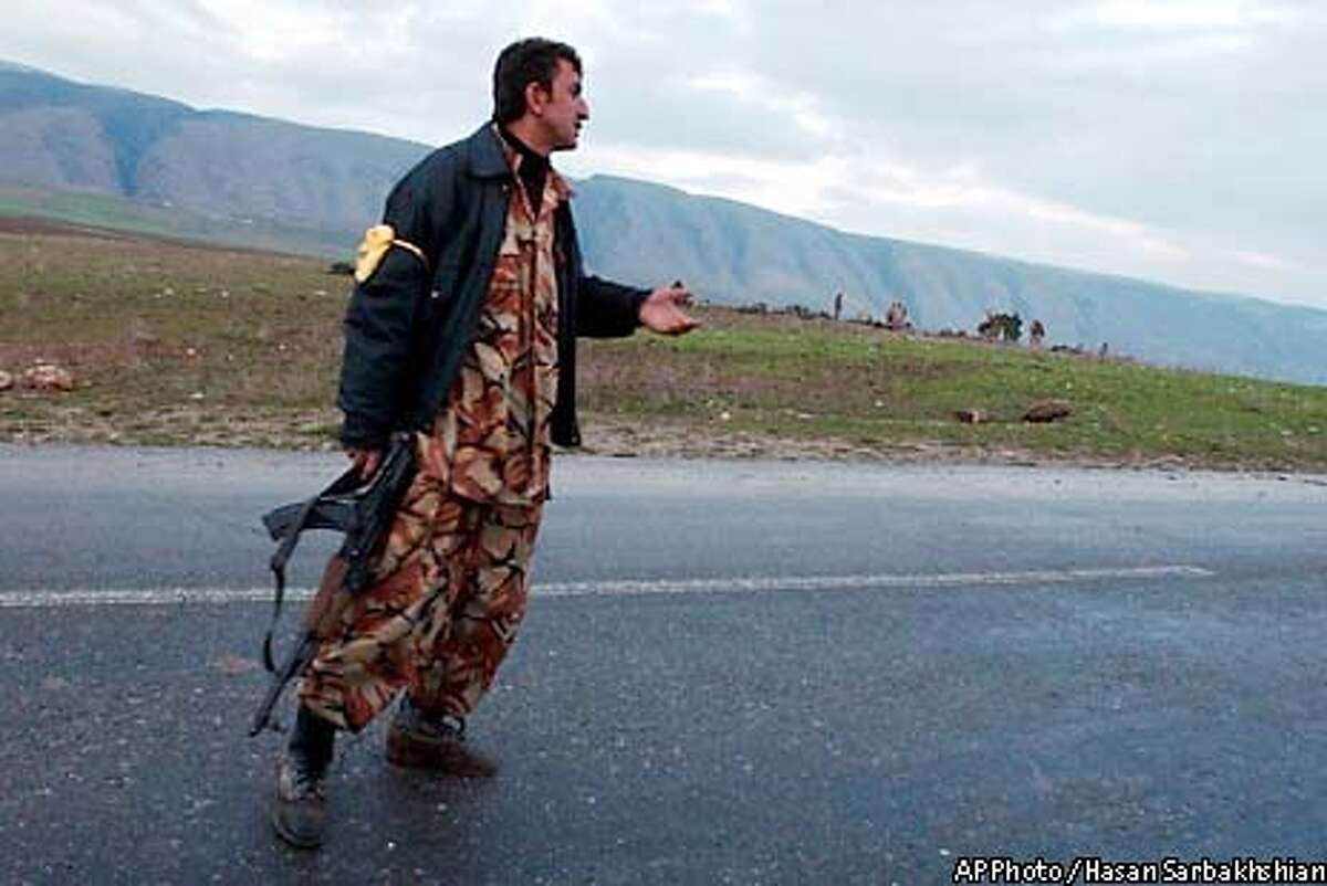 NORTHERN FRONT: paratroopers spend day digging out of the mud