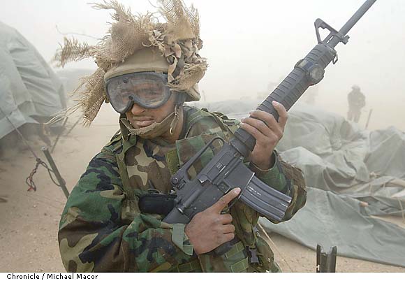 Sandstorms, militia resistance slow Marine advance