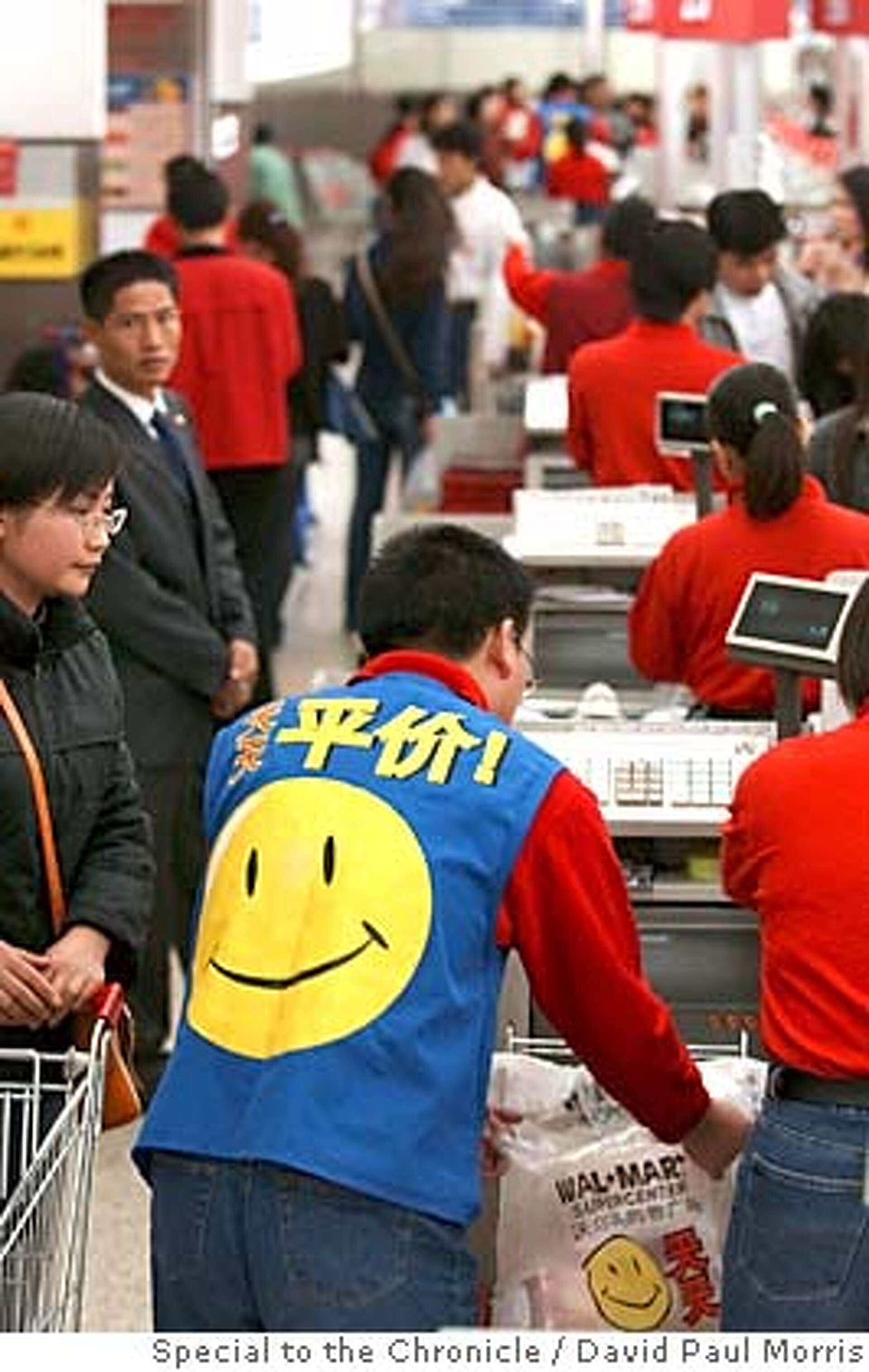 Wal-Mart's China operation a study in contrasts / Workers at many of ...