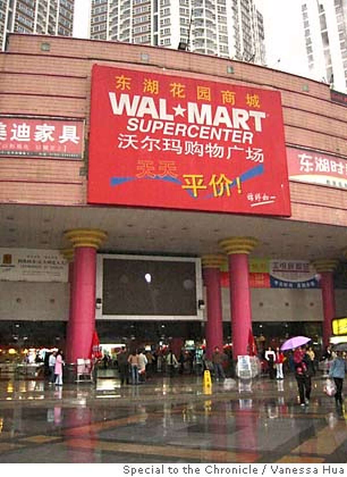 Wal-Mart's China operation a study in contrasts / Workers at many of ...