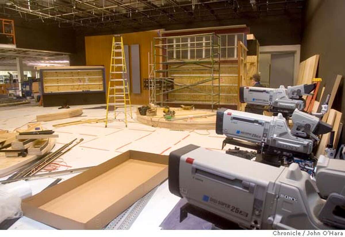 Now broadcasting live from a sleek, new set -- in the fight for ratings ...