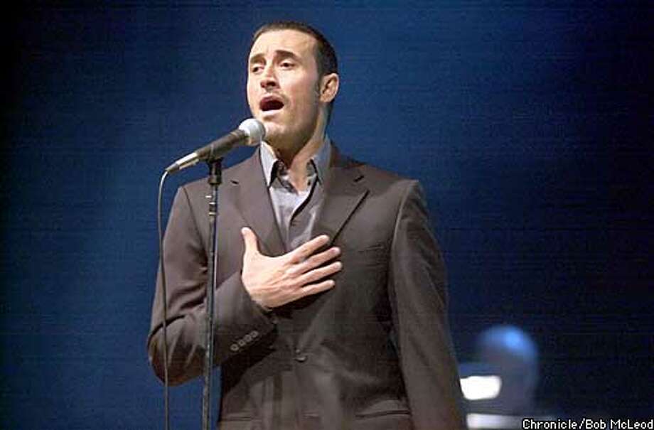 Arab pop superstar al-Sahir blends beauty, pain, peace / Baghdad-born ...