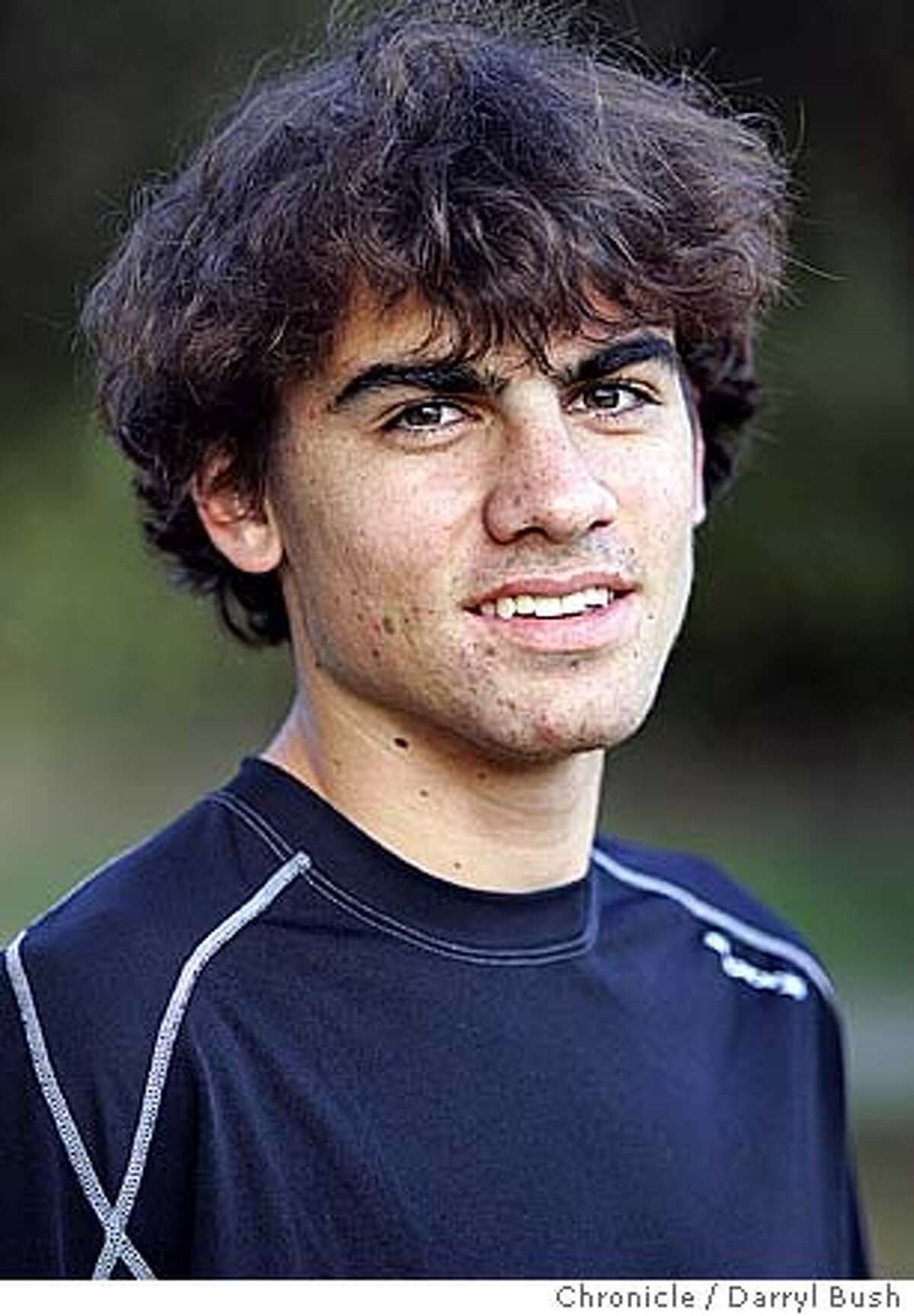 St. Francis runner moving to the head of the pack / Sitler heads for ...