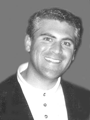 Peter Rowland -- charismatic playboy, convicted swindler