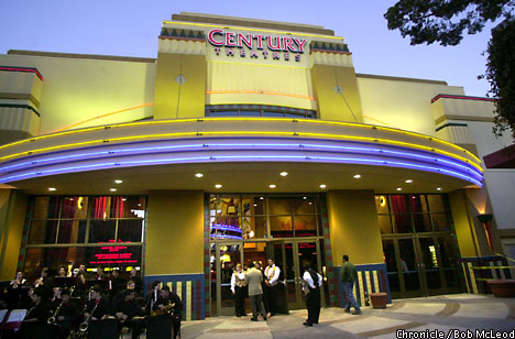 Megaplex mania / Now playing all over the Bay Area, with 'love seats ...