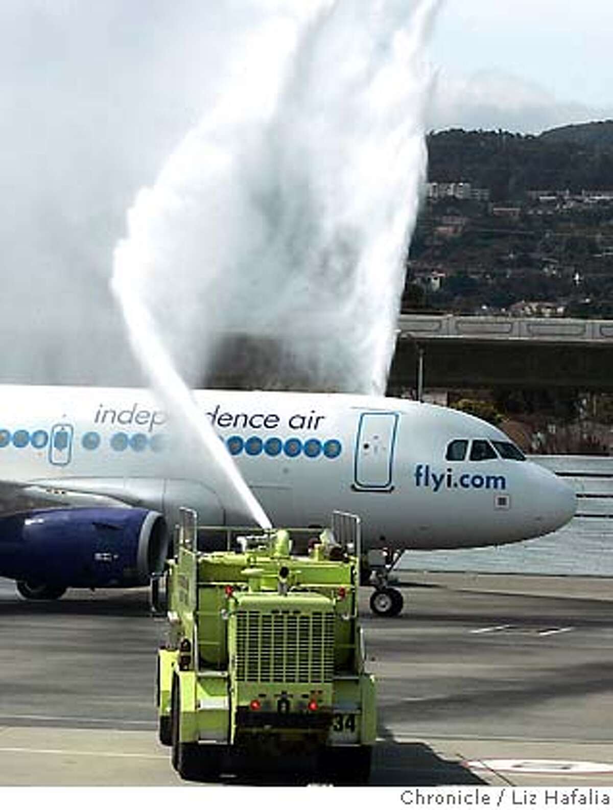 Cake and concern greet arrival of Independence Air at SFO / Low-fare ...