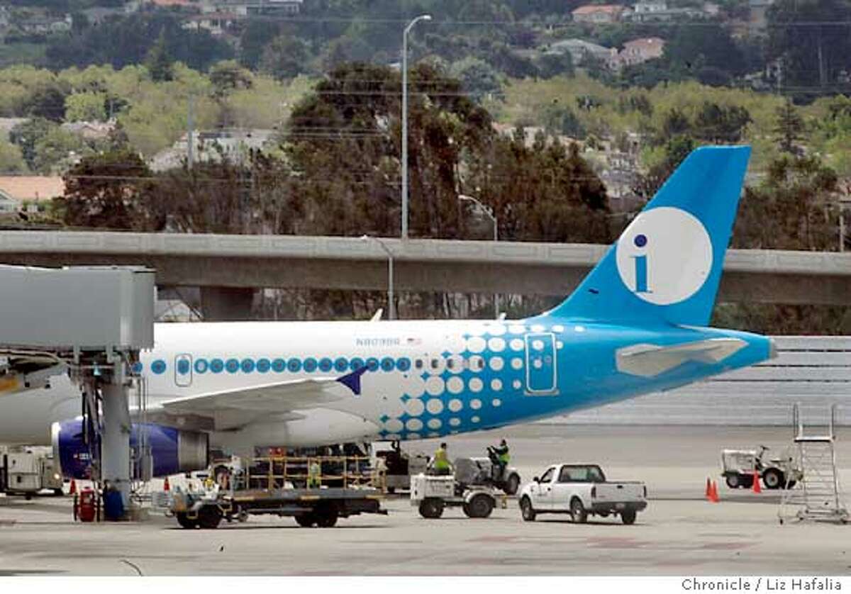 Cake and concern greet arrival of Independence Air at SFO / Low-fare ...
