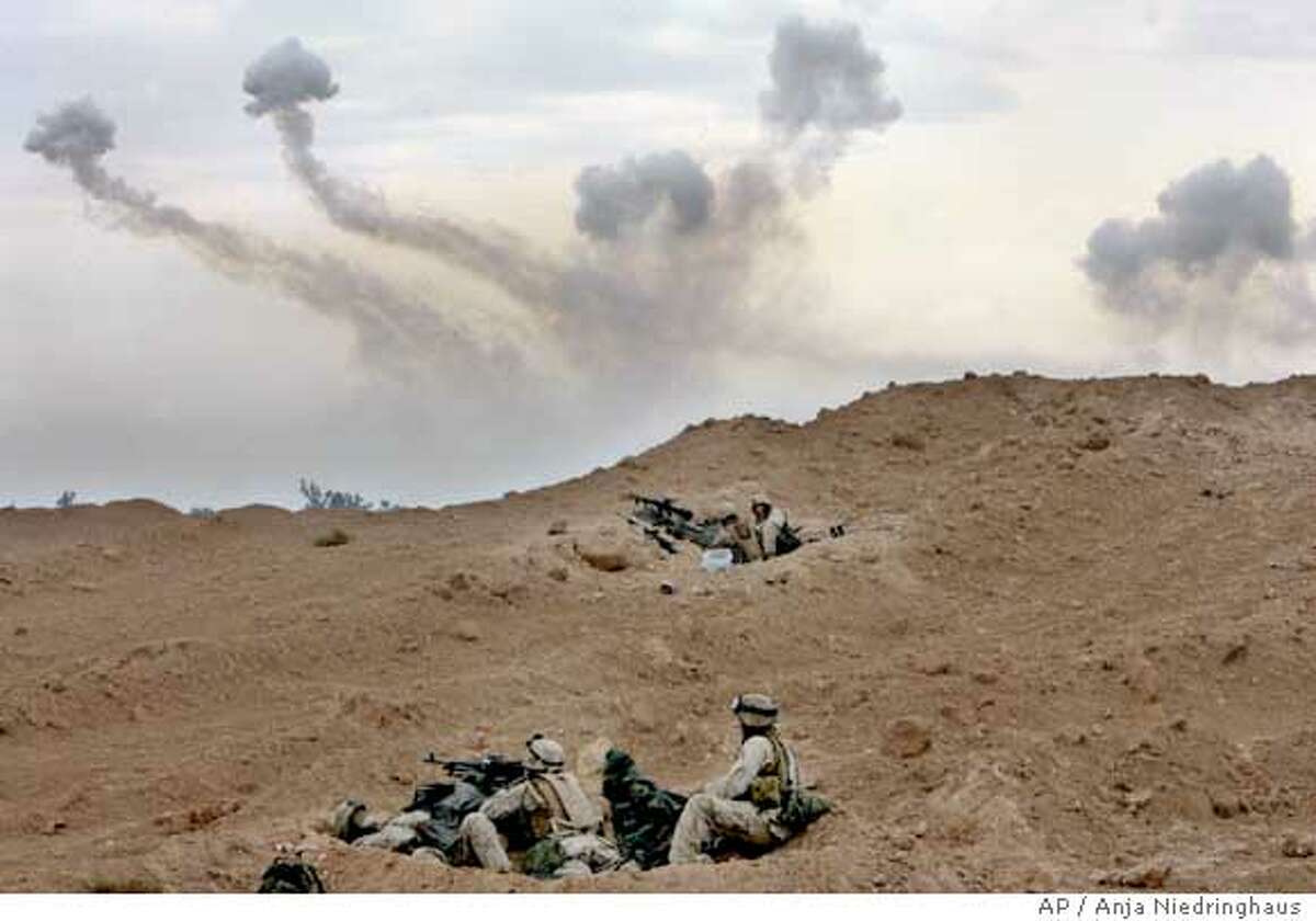 Intense combat in Fallujah streets / Firefight: Troops go house-to ...