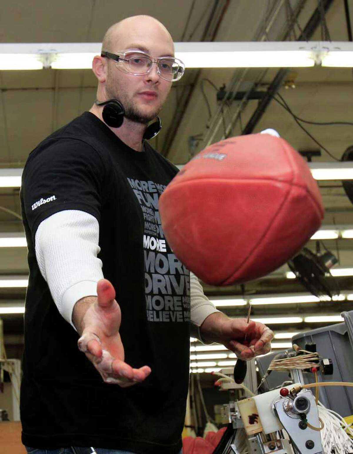 Making footballs for Super Bowl