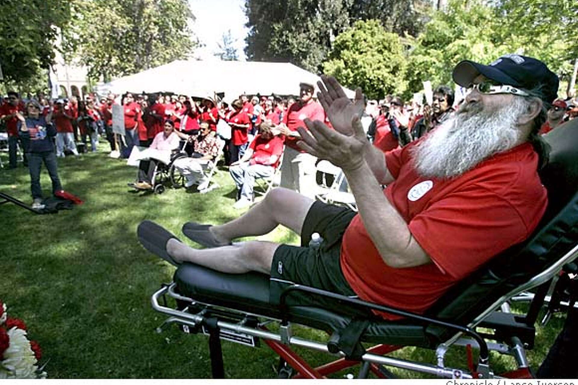 Protesters greet anniversary of workers' comp reform