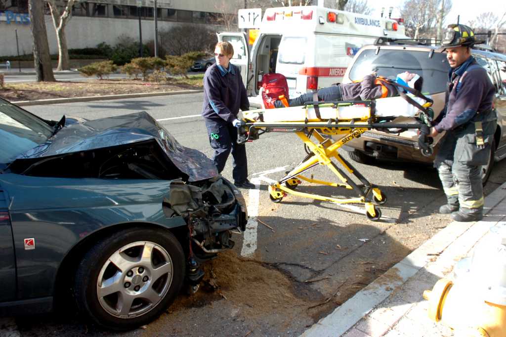 Car collides with bus in Bridgeport