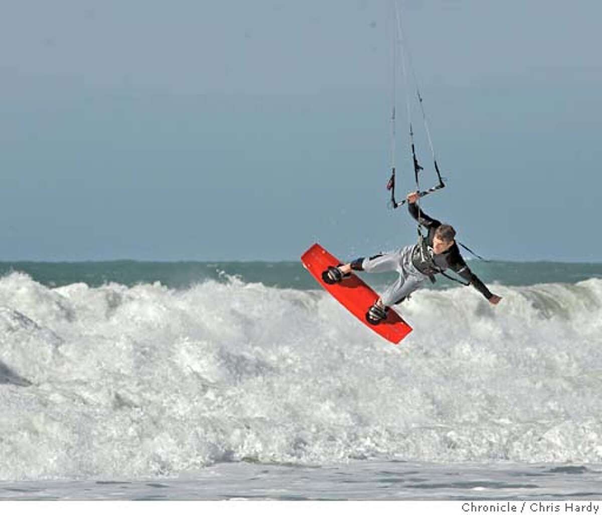 Up, up and a wave / Kitesurfers ride high on exhilaration, growing ...