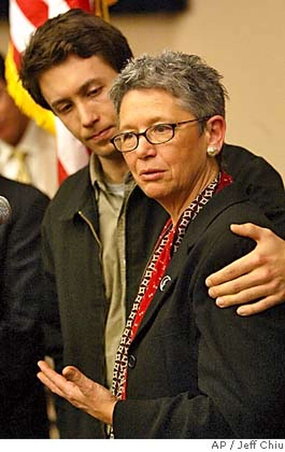 Judge strikes down ban on same-sex marriage / COUPLES REACT: 'One step ...