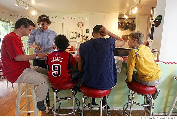 A home in the world / Foster parents provide care and consistency to ...