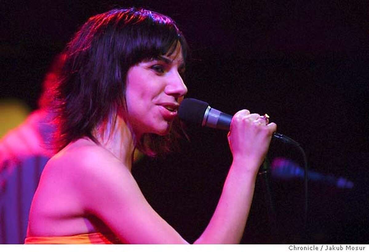 P.J. Harvey -- uh huh, her -- shows hard-rock edge with ripping guitar ...