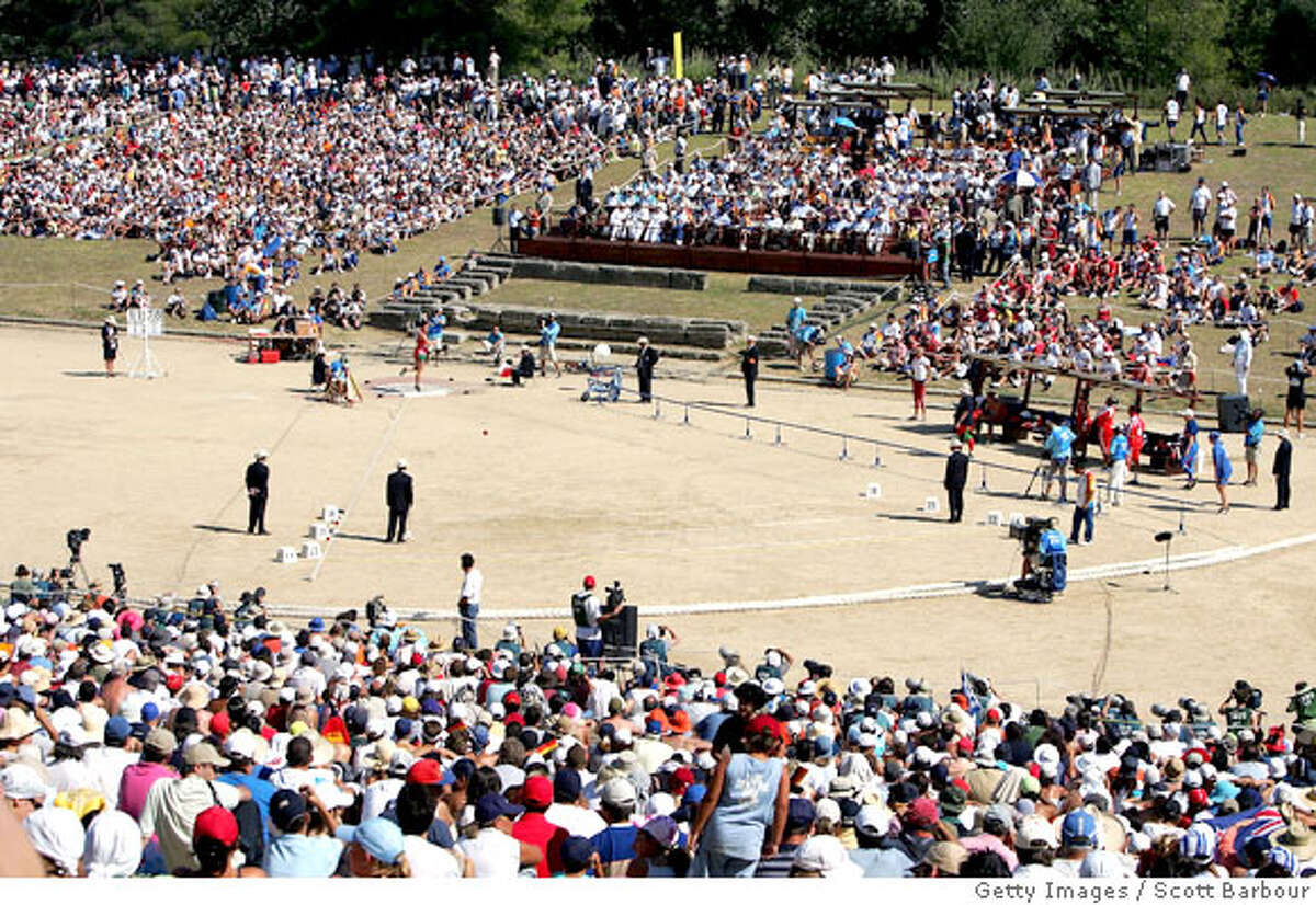 Shot putters bask in history at site of ancient Games / Bay Area woman ...
