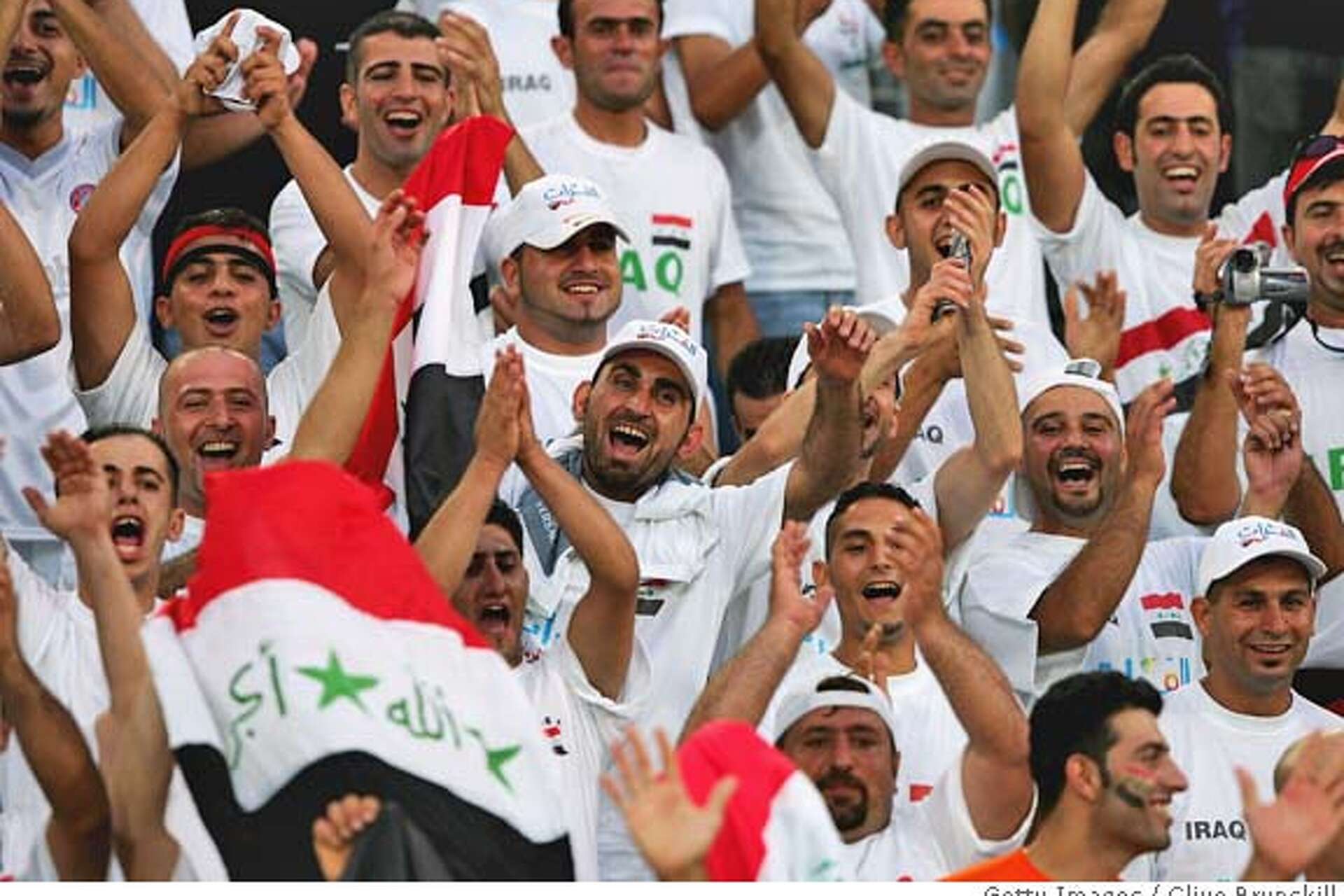Iraqi soccer team stuns Portugal, lifts war-torn nation / Risky path in ...